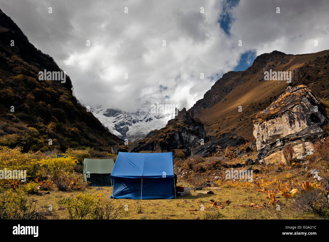 BHUTAN - Cloud covered Jhomolhari and ruined watchtower stand guard ...
