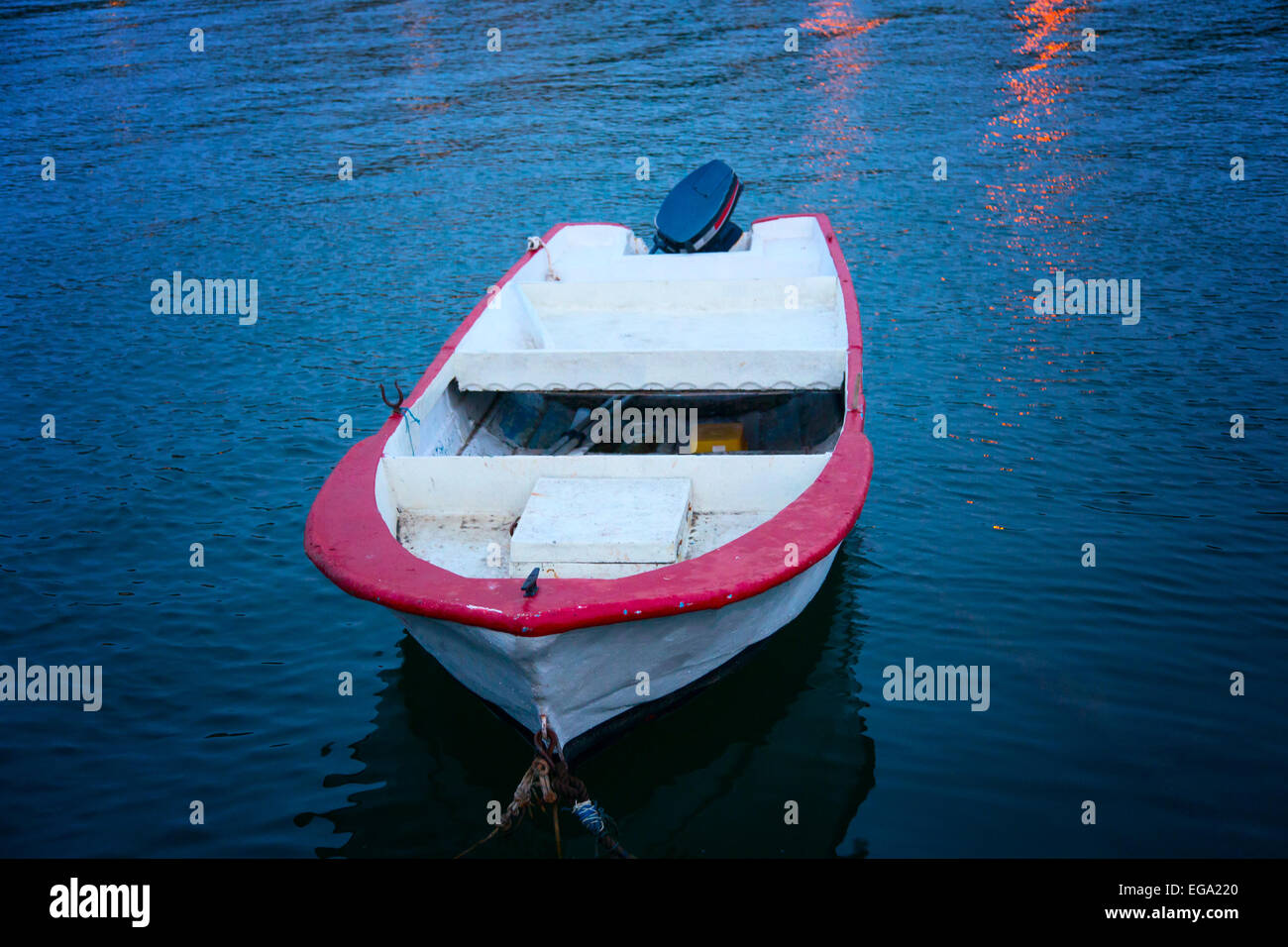 sea boat calm blue twilight Stock Photo - Alamy