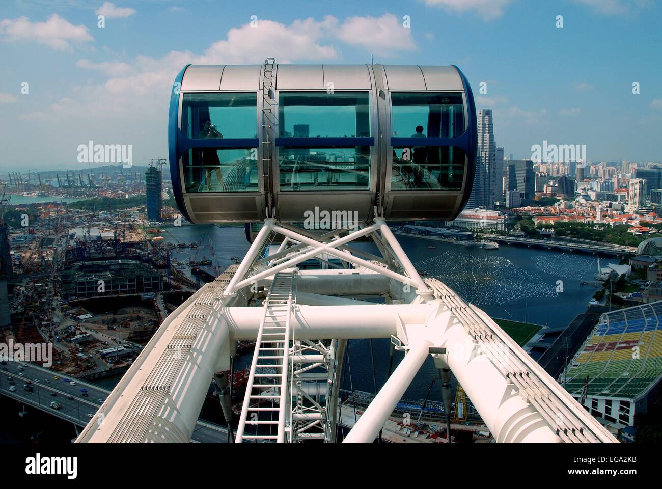 Singapore: A passenger capsule at the top of the 541 foot high ...