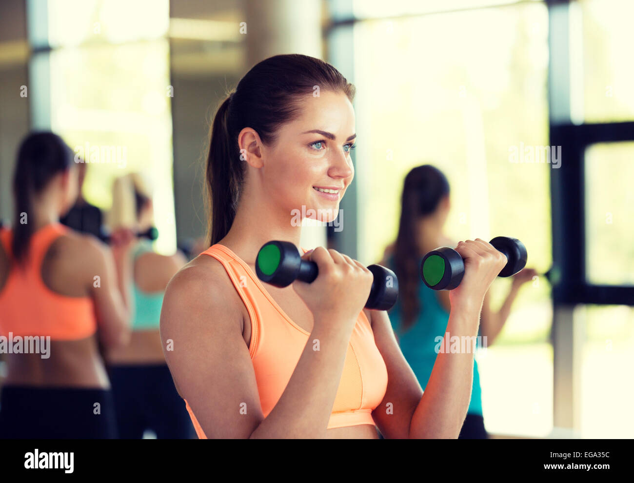 group of women with dumbbells in gym Stock Photo - Alamy