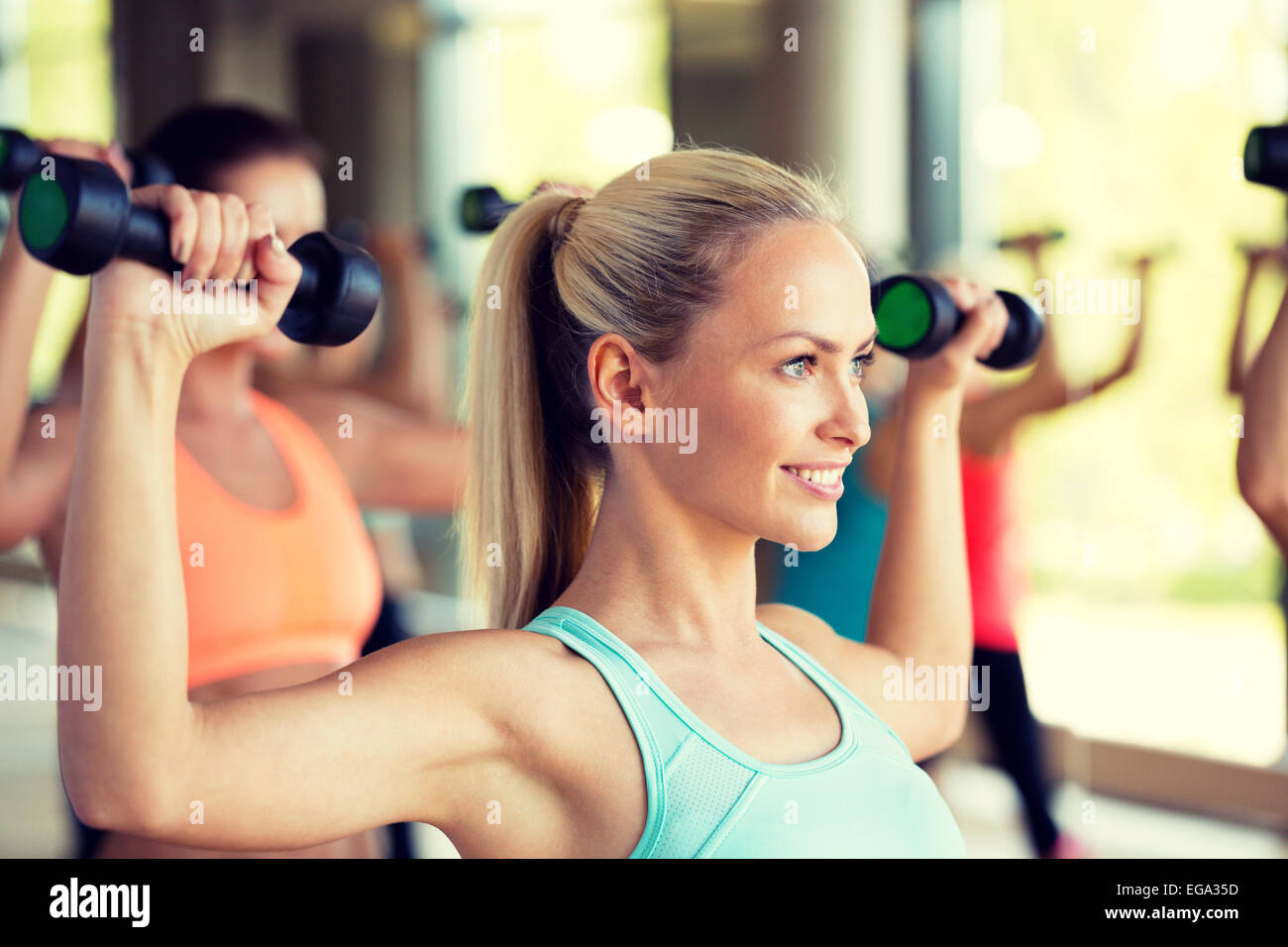 group of women with dumbbells in gym Stock Photo - Alamy
