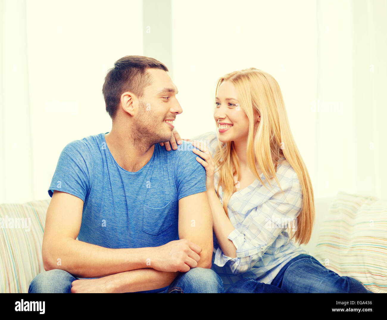 smiling happy couple at home Stock Photo - Alamy