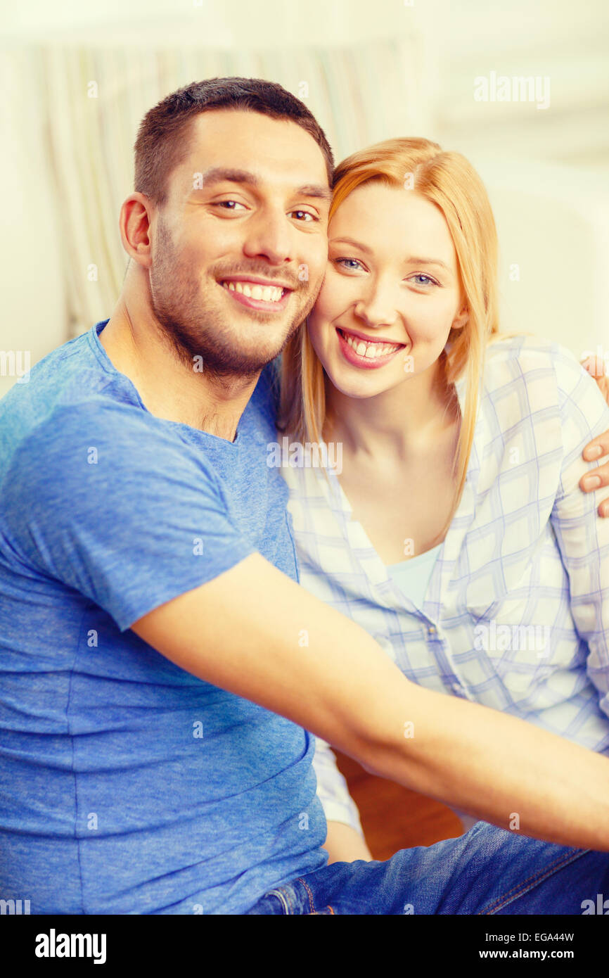smiling happy couple at home Stock Photo - Alamy