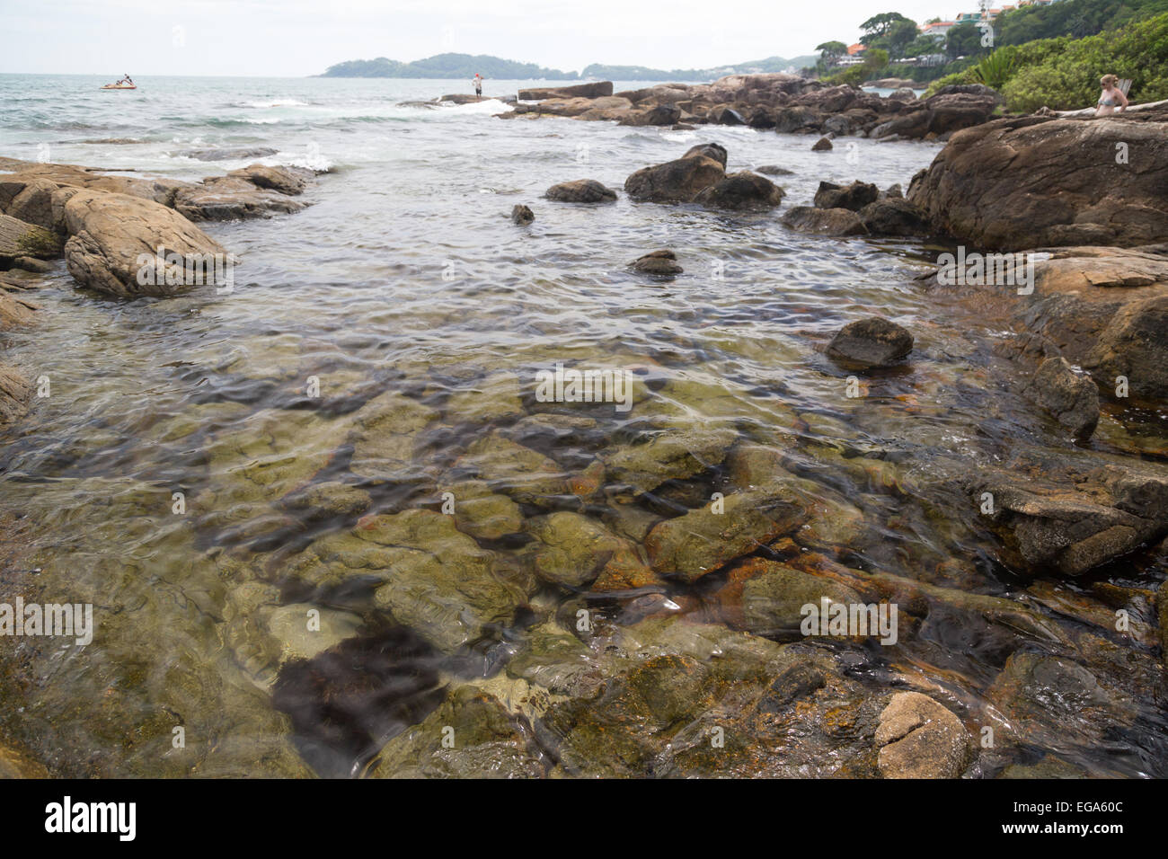 Tide pools. Praia do Ribeiro is a small rugged beach located between ...