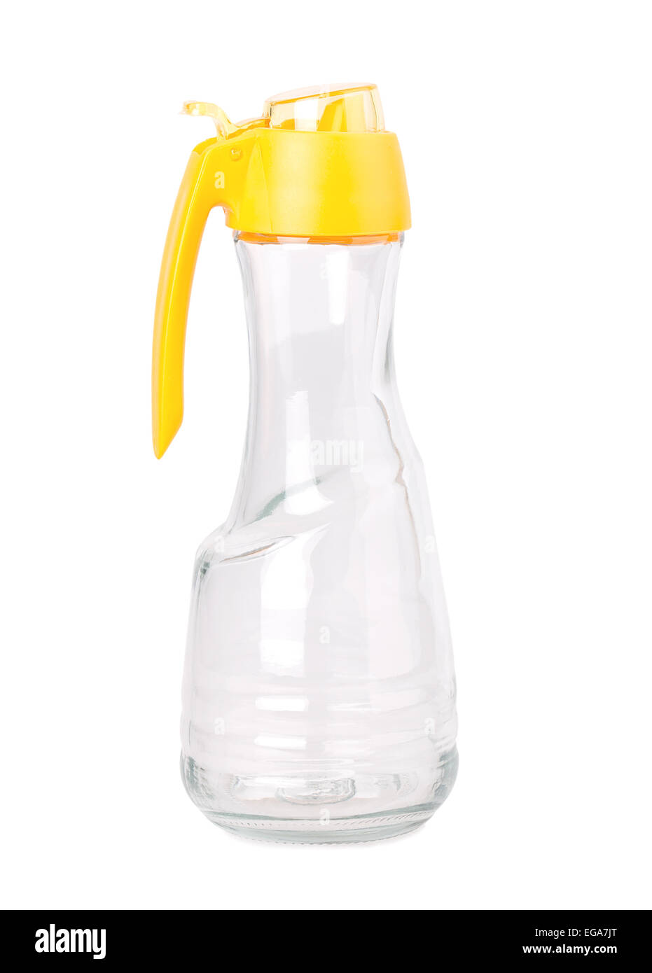 glass container for liquid with yellow cap Stock Photo - Alamy