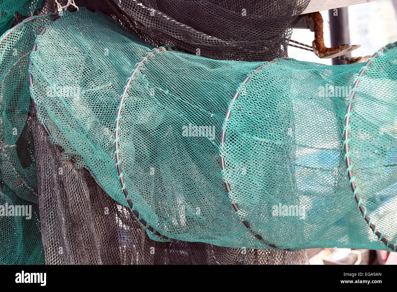 large fishing nets in fishing boat at the pier in italy Stock Photo - Alamy