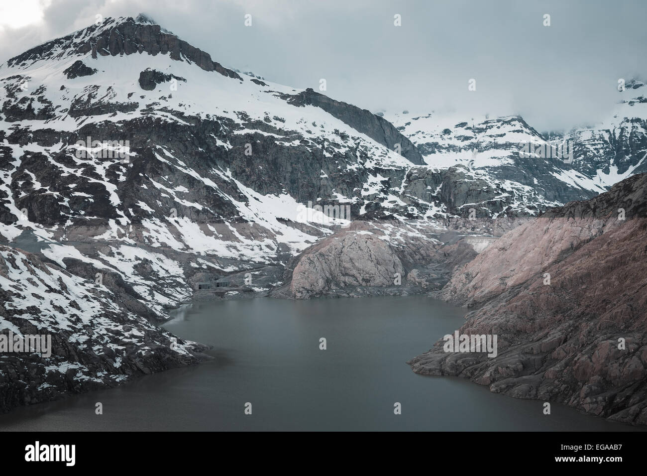 Drowned dam and emptied reservoir, Lac d'Emosson, Valais, Switzerland ...