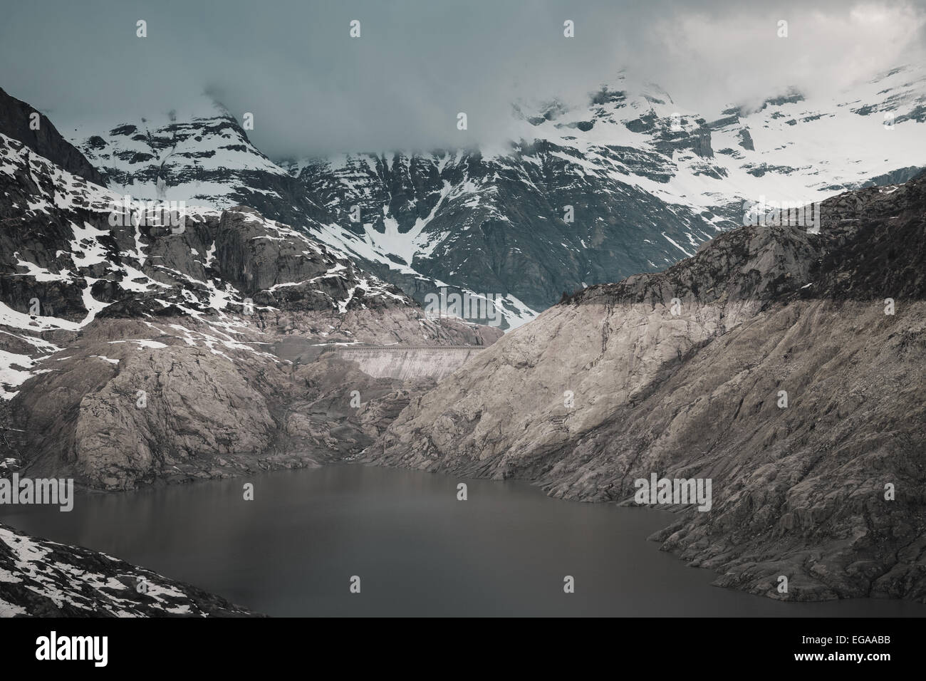 Drowned dam and emptied reservoir, Lac d'Emosson, Valais, Switzerland ...