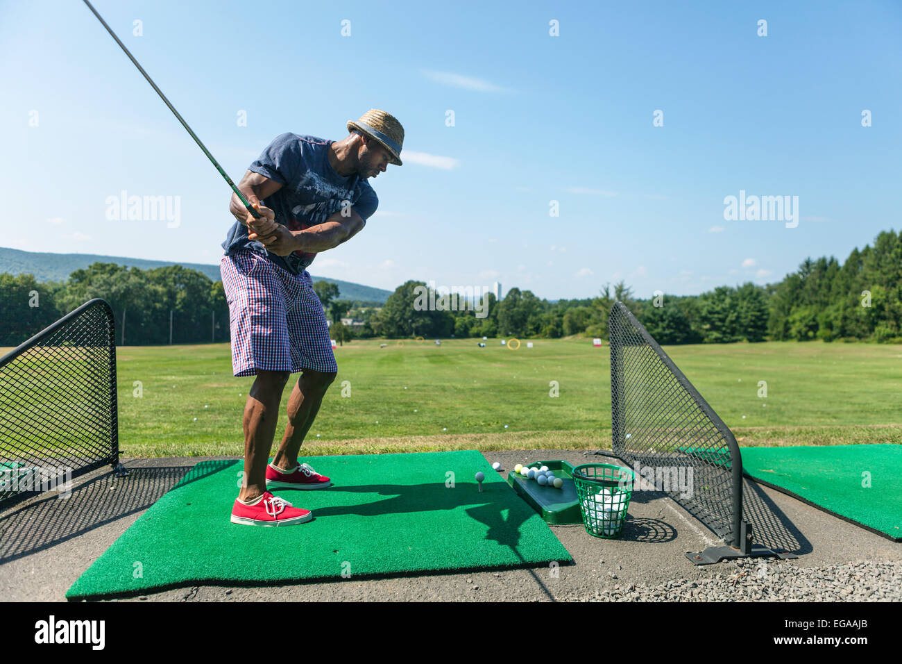 Golf Practice at the Driving Range Stock Photo - Alamy