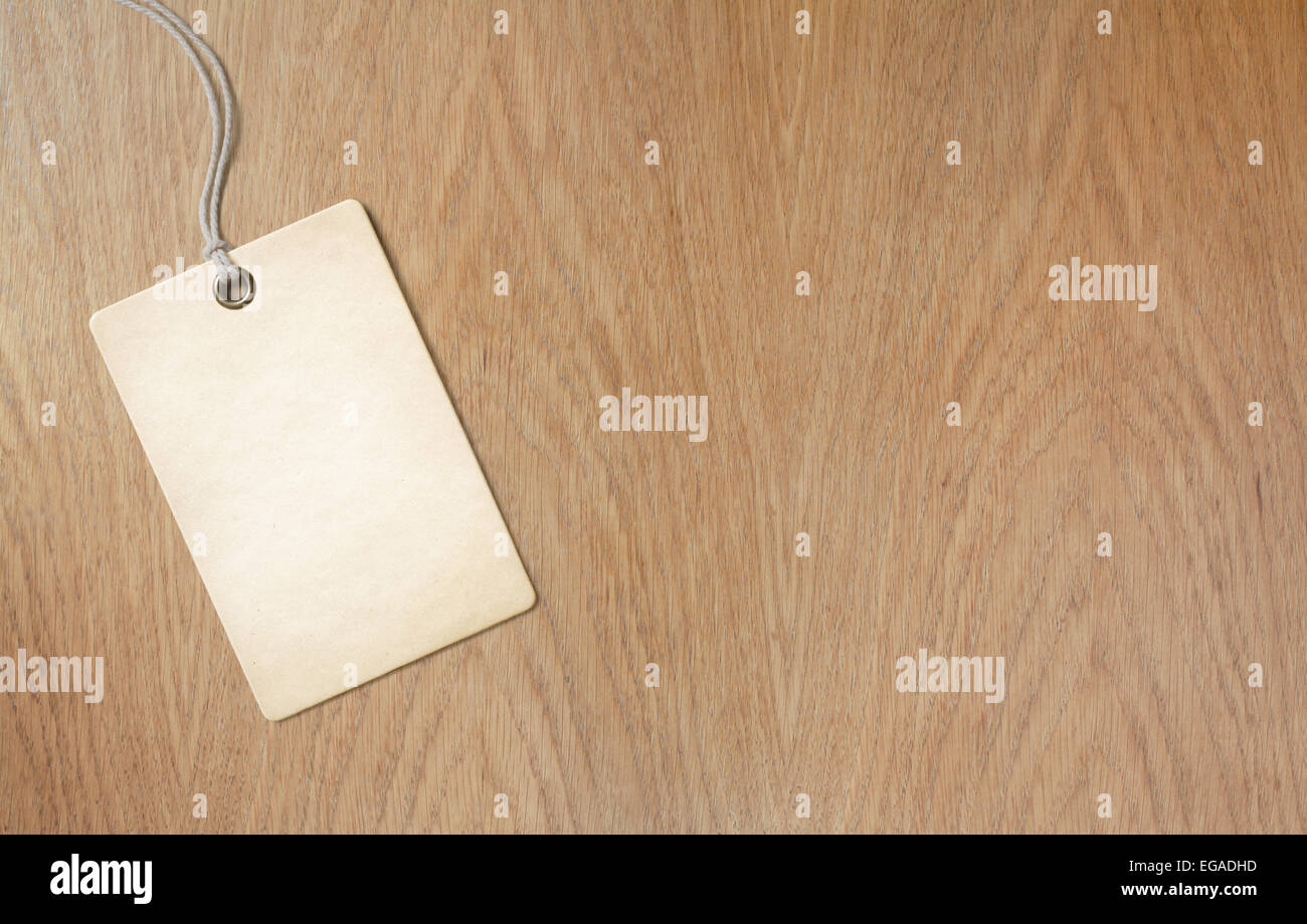 price label or tag on wooden table background Stock Photo - Alamy