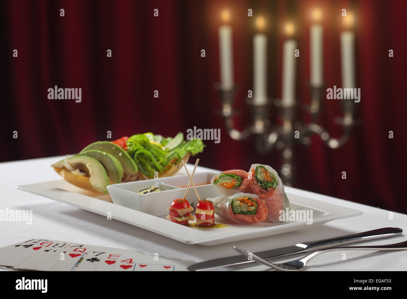 close up view of nice delicious meal on color back Stock Photo - Alamy