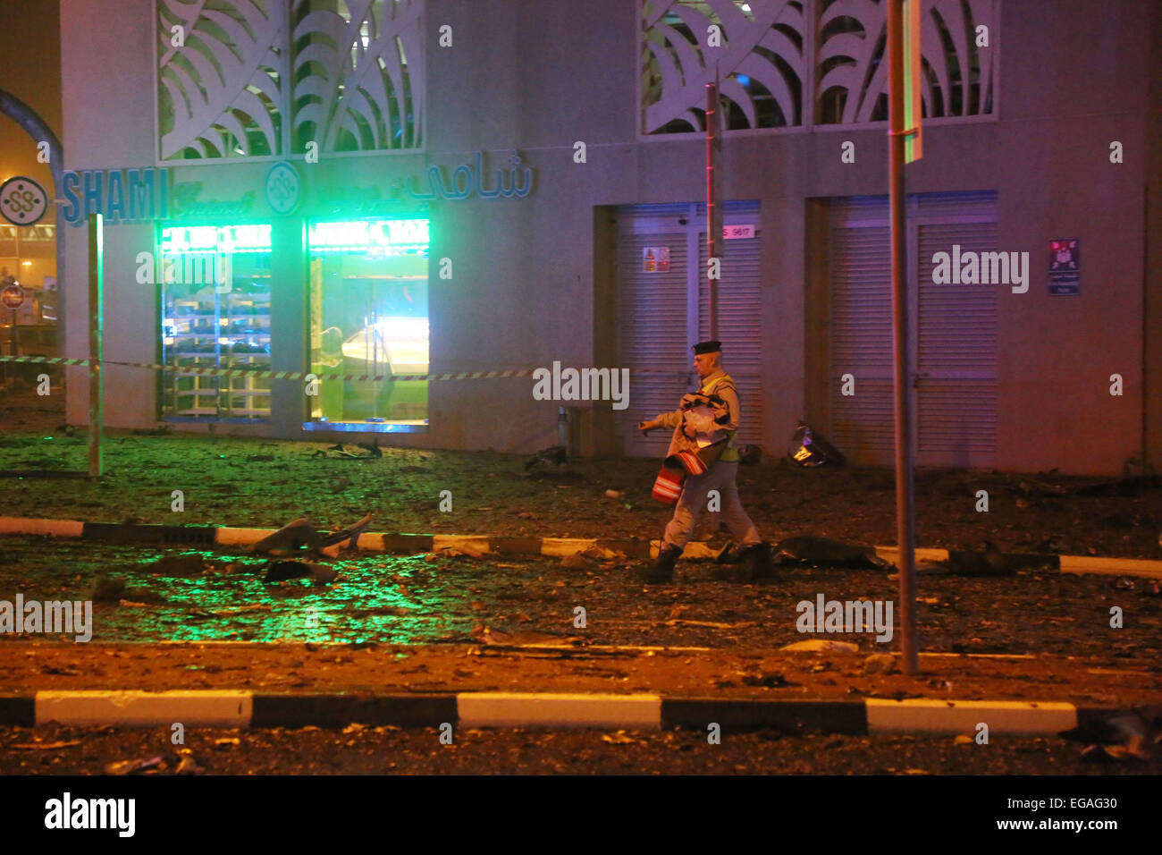 Dubai, United Arab Emirates (UAE). 21st Feb, 2015. A firefighter walks ...
