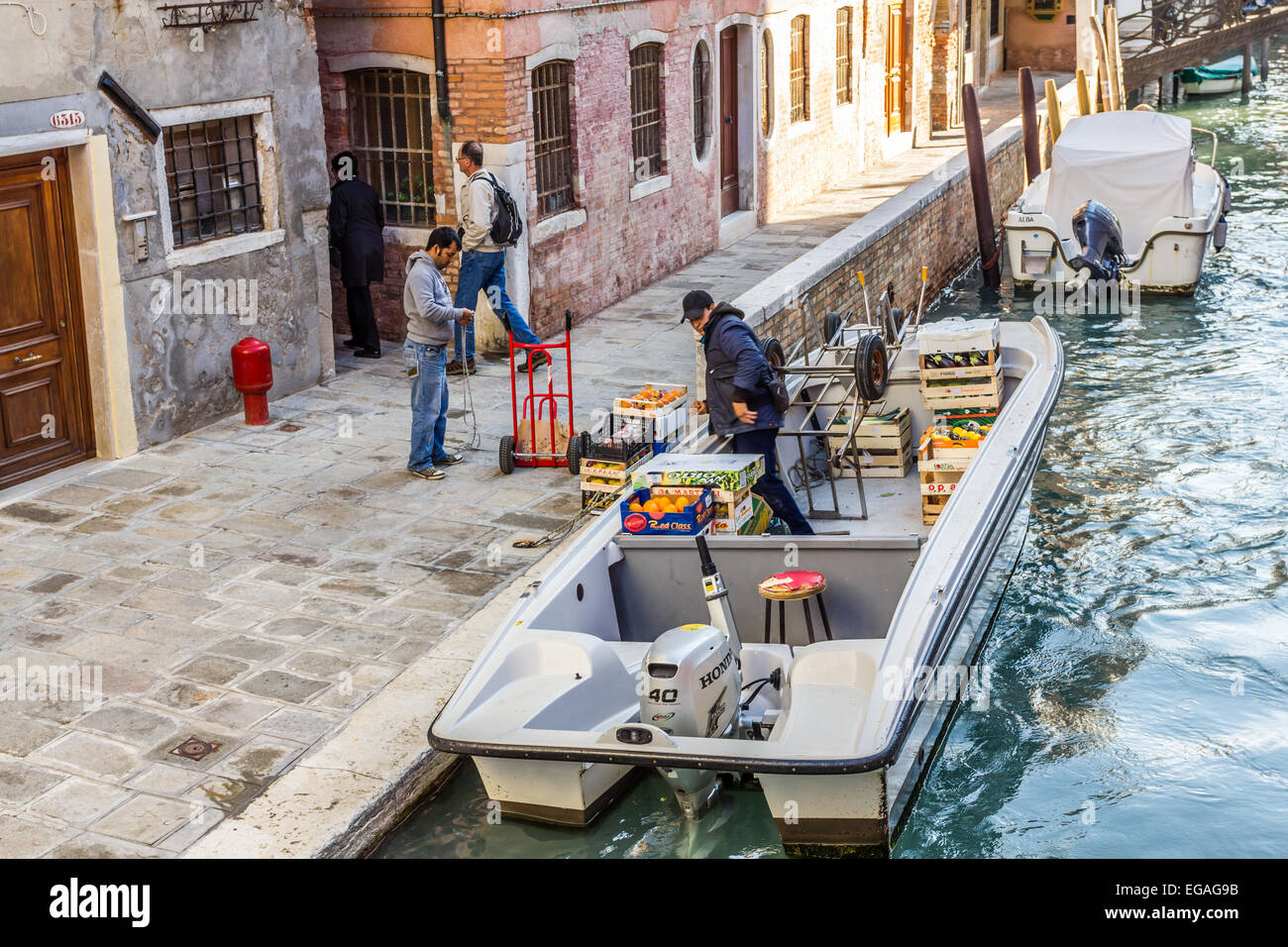 Cargo boat delivering supplies. All goods in Venice are distributed by ...