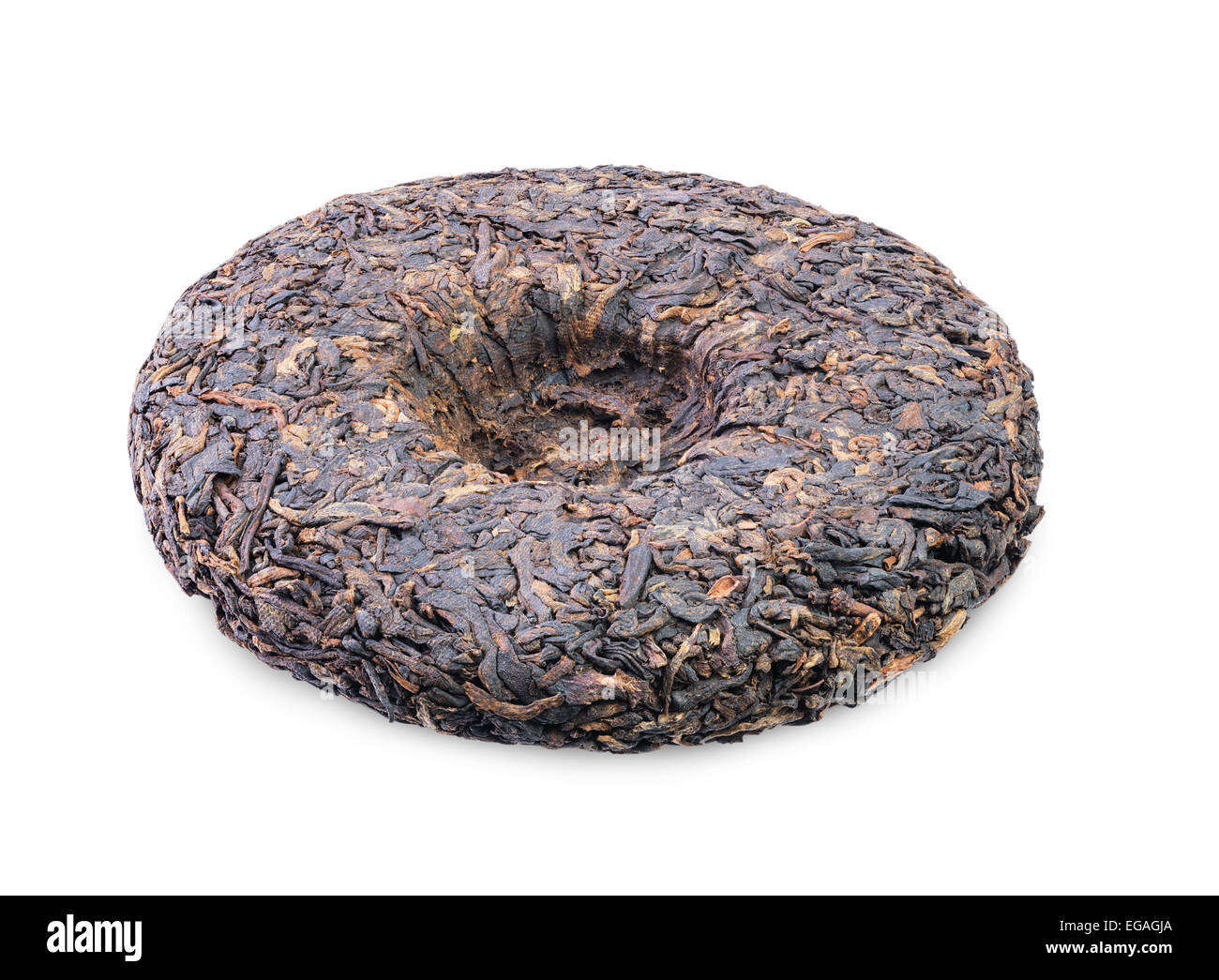 Aged chinese puer tea disk isolated on white background Stock Photo - Alamy