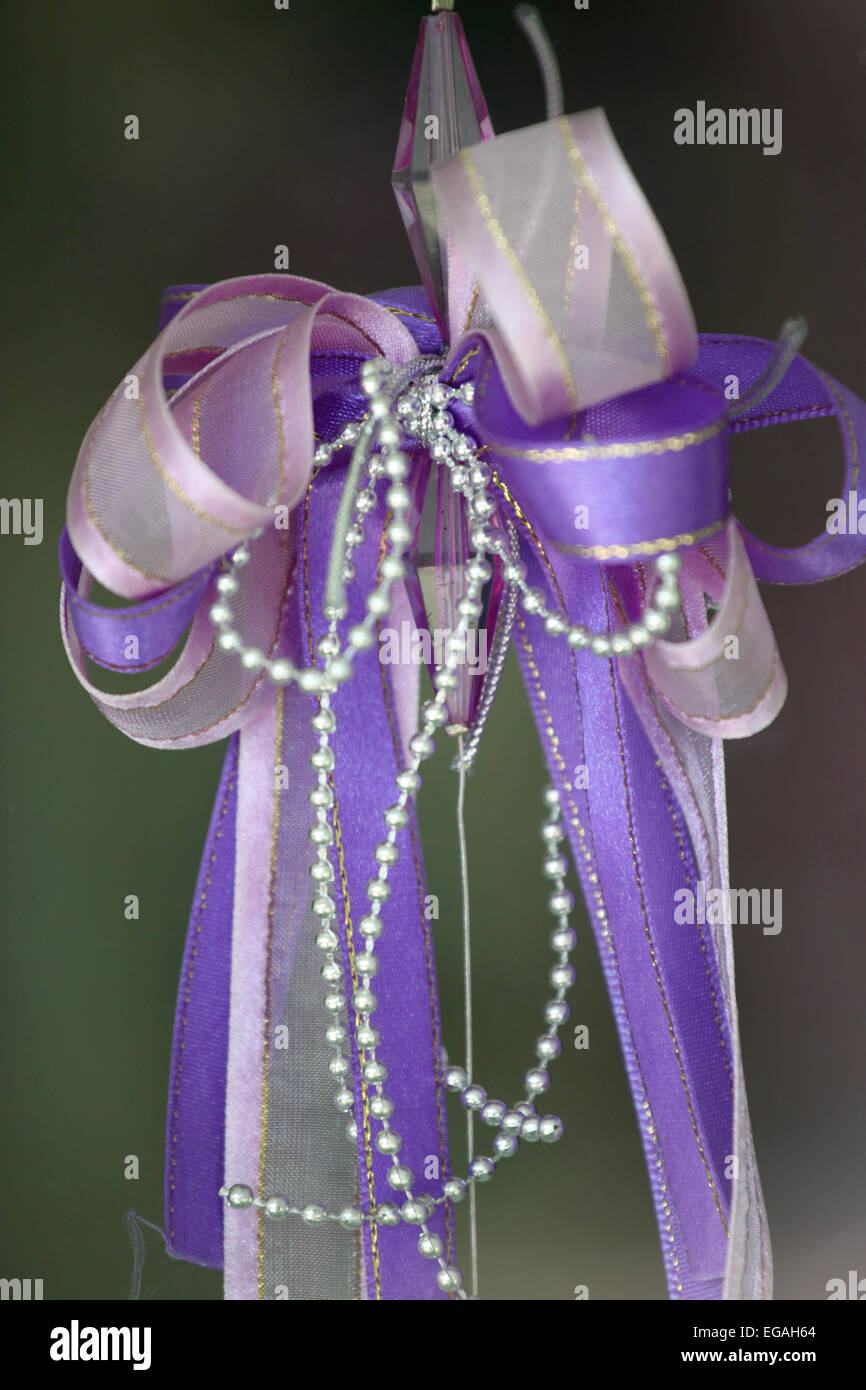 Purple bow for the gift box Stock Photo - Alamy