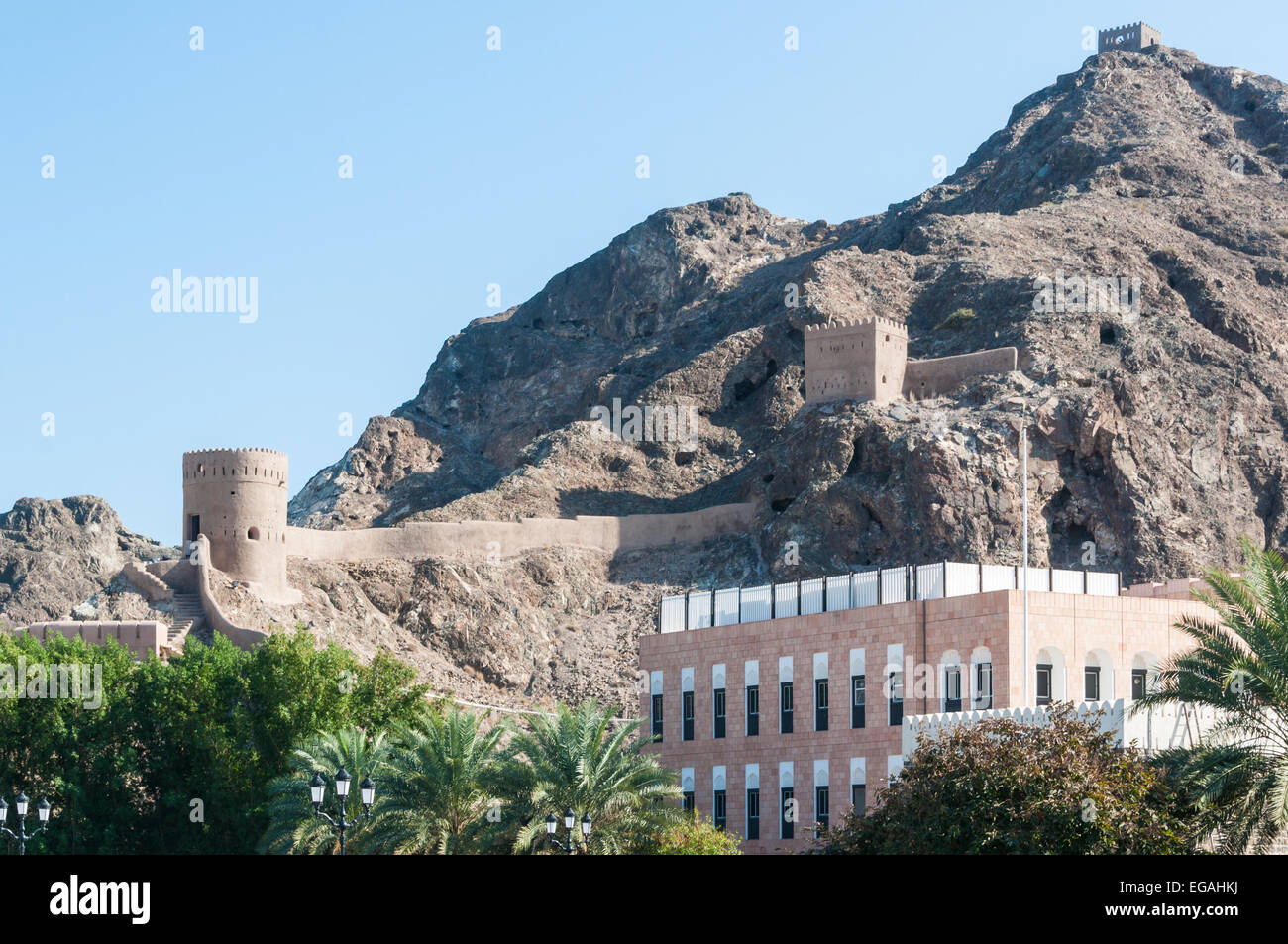 Watchtower and city wall, Muscat Stock Photo - Alamy