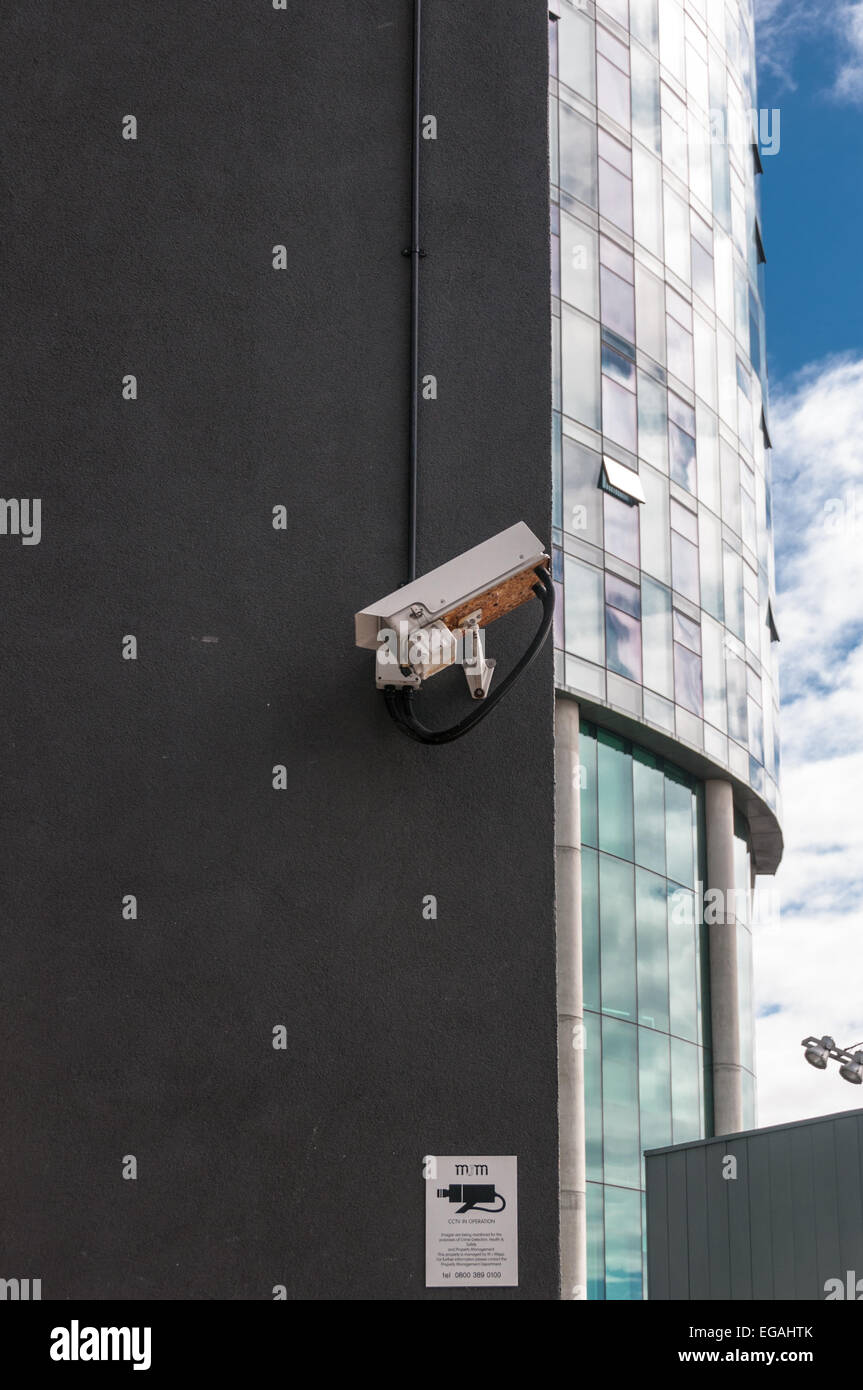 CCTV recording on side of an office building Stock Photo - Alamy