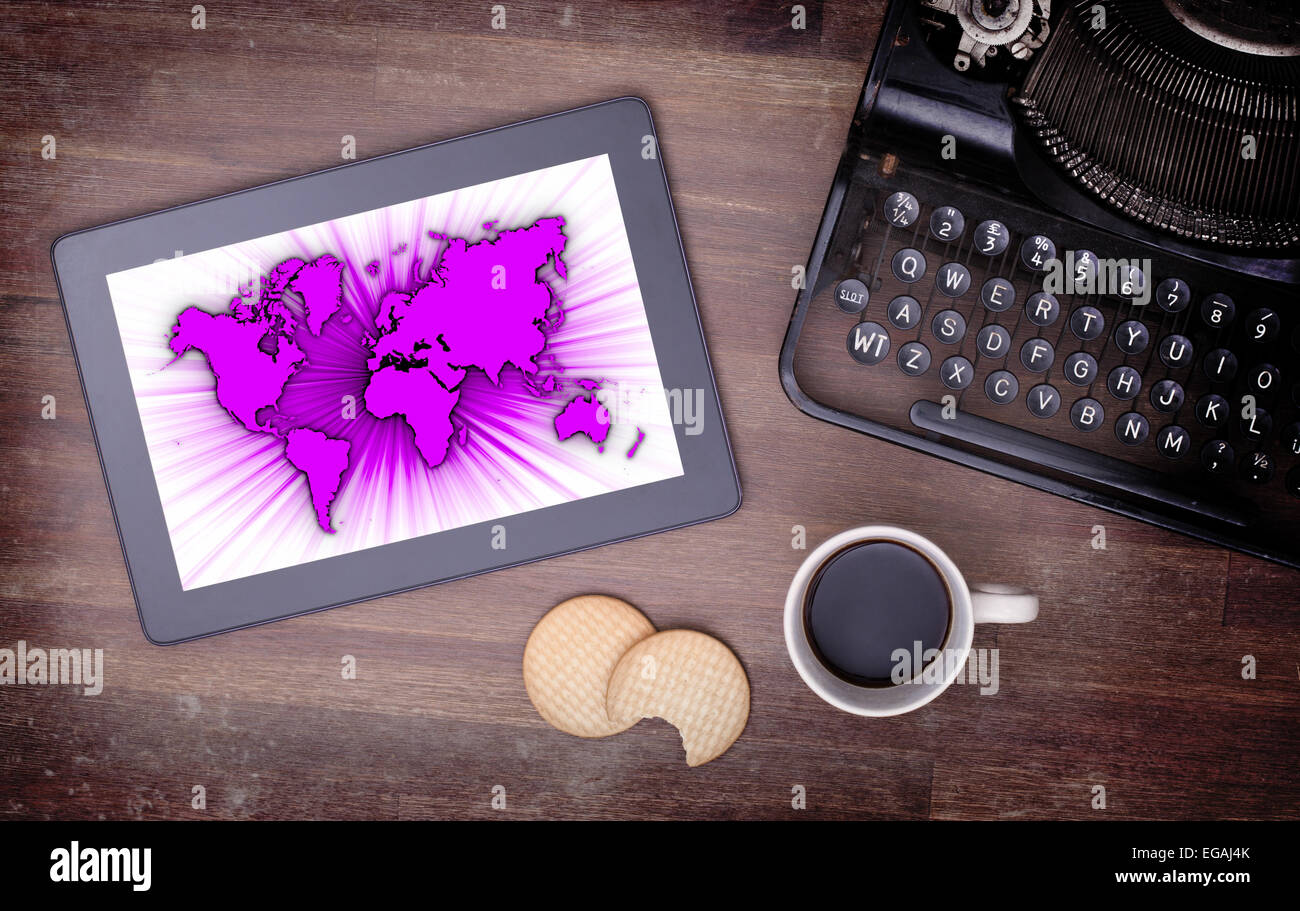 World map on a tablet, concept of globalisation Stock Photo - Alamy