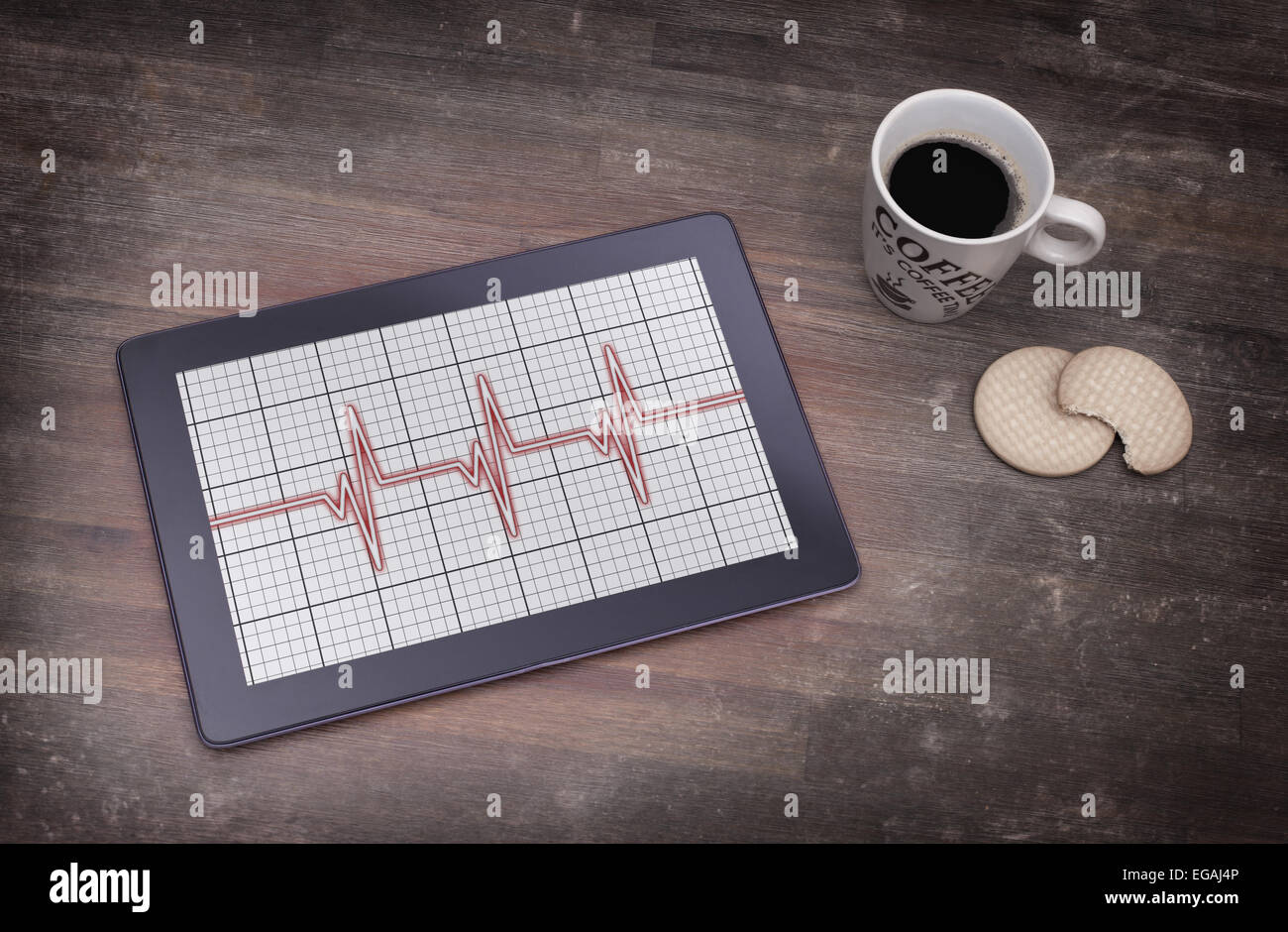 Electrocardiogram on a tablet - Concept of healthcare, heartbeat shown ...