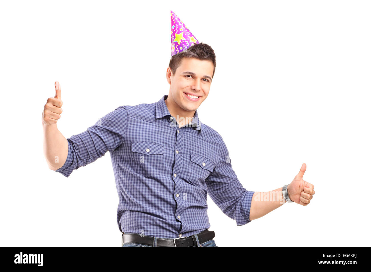 Guy with party hat giving thumbs up isolated on white background Stock ...