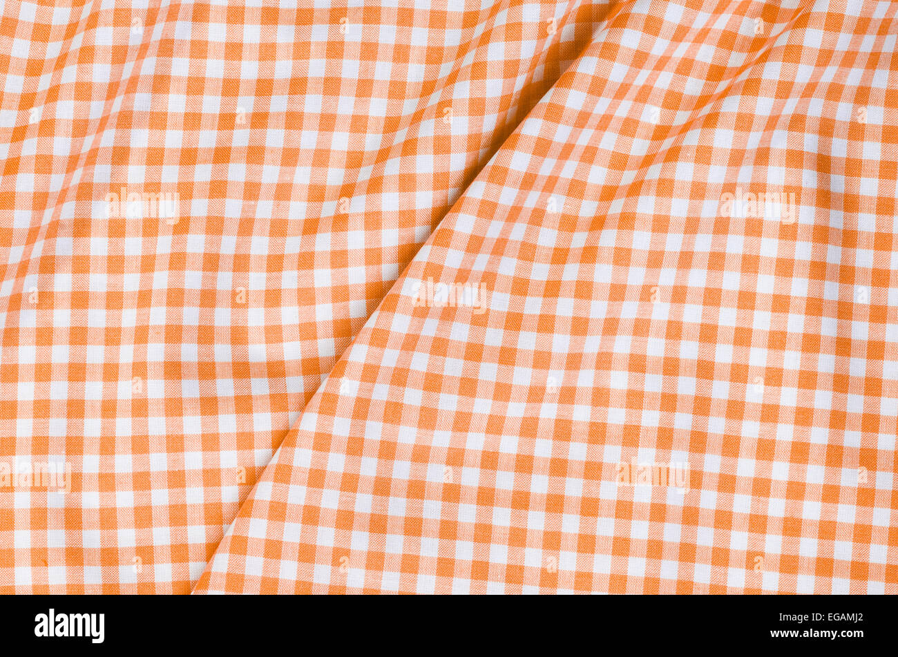 background of orange checkered fabric tablecloth Stock Photo - Alamy