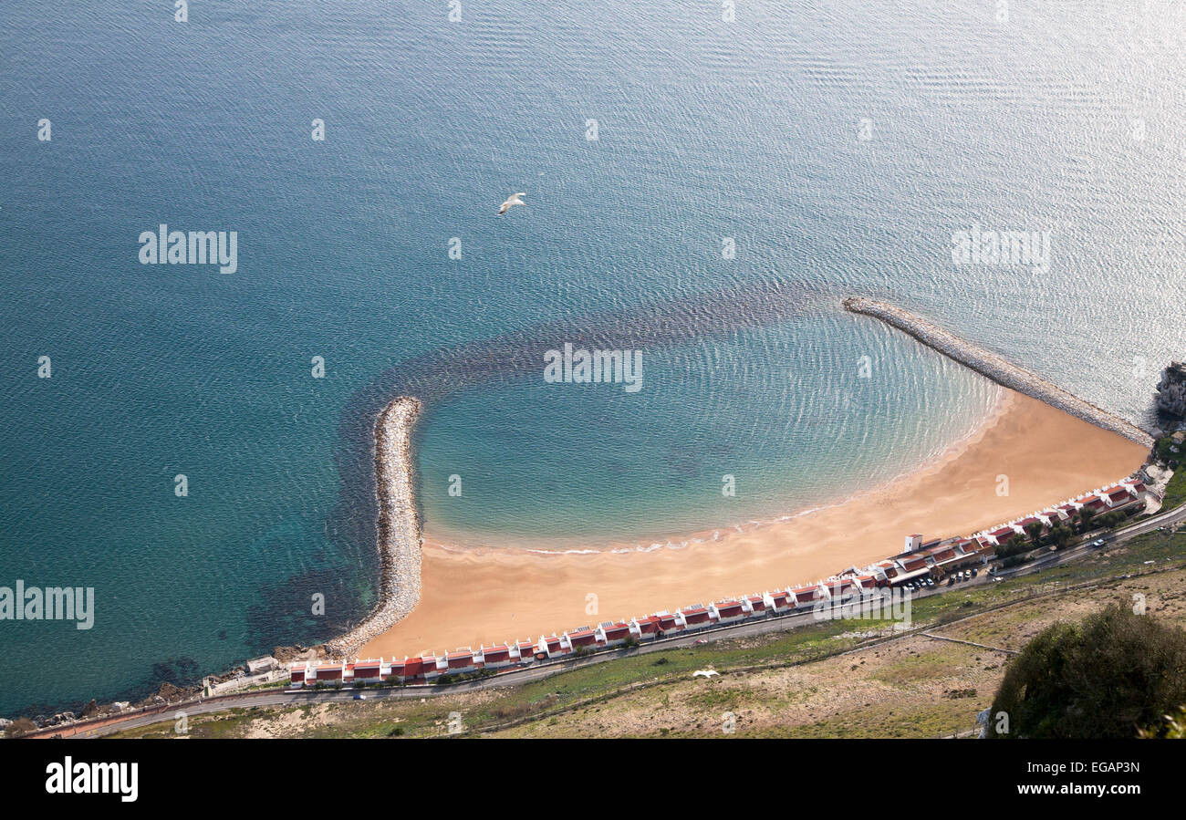 Sandy bay beach created by rock groynes, Gibraltar, British terroritory ...