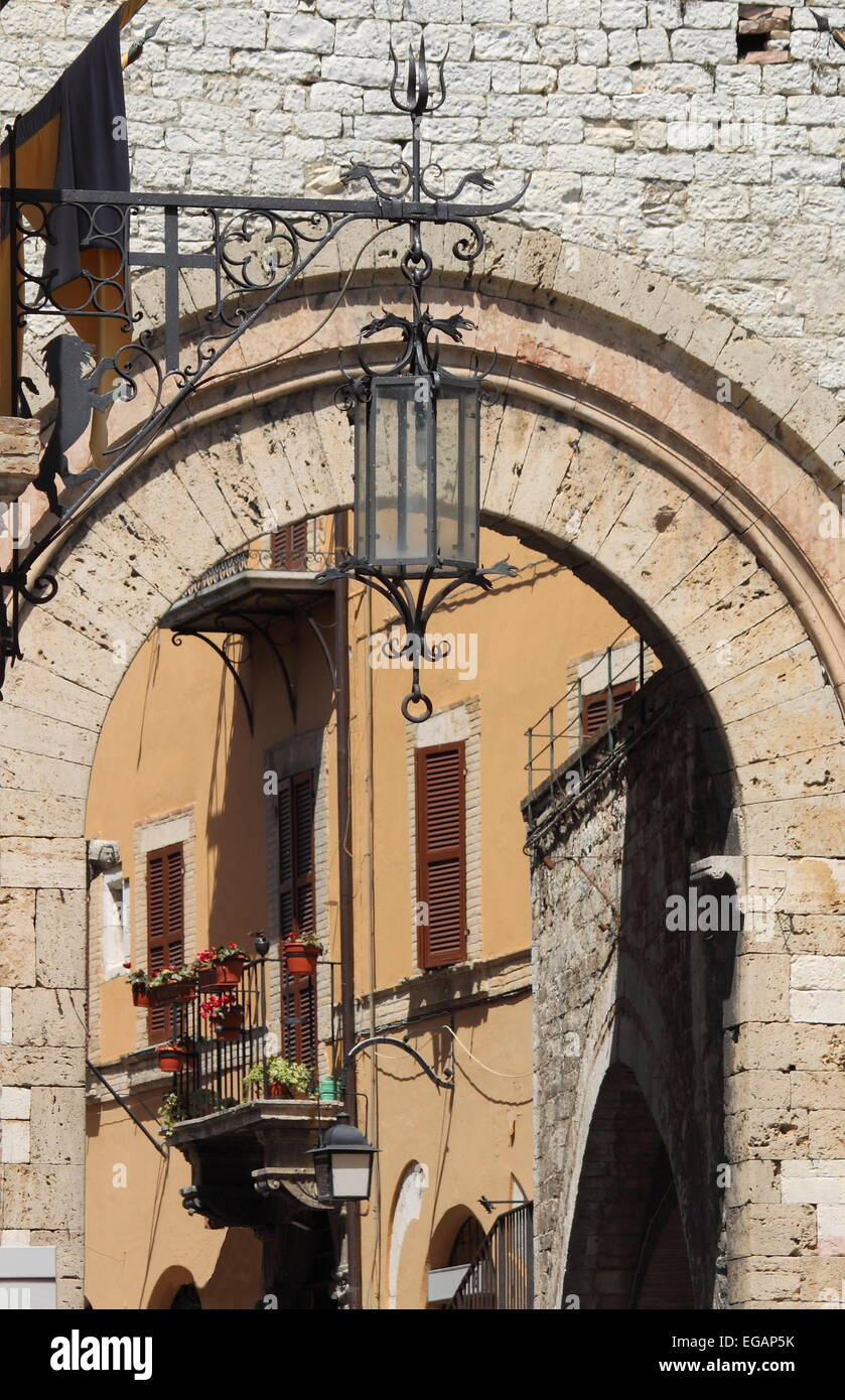 Medieval corner with street lamp in Assisi, Italy Stock Photo - Alamy