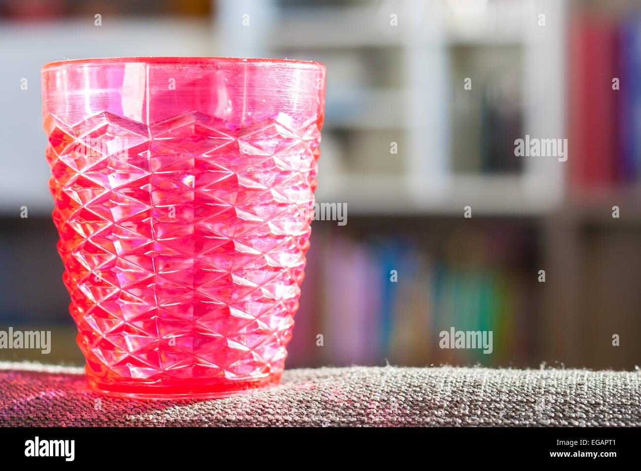 Goblet on the sun. Red Glass Stock Photo - Alamy