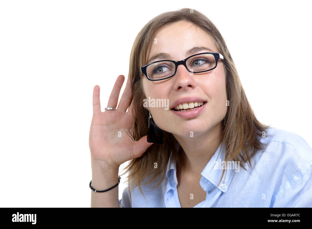 the young woman listen on the white background Stock Photo - Alamy