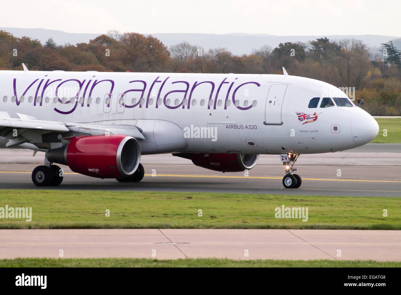 Virgin Atlantic Airbus A320, taxiing on Manchester Airport runway Stock ...
