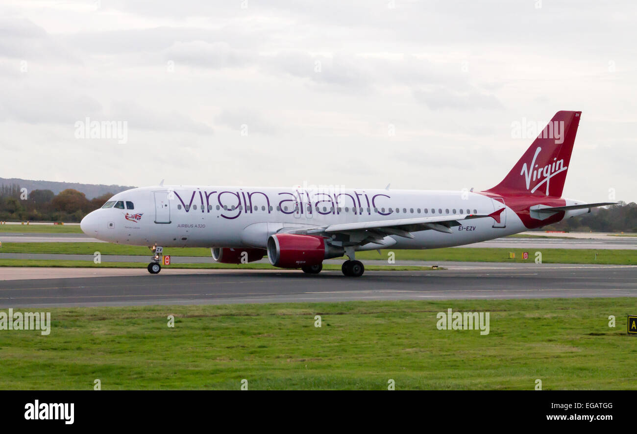 Virgin Atlantic Airbus A320, taxiing on Manchester Airport runway Stock ...
