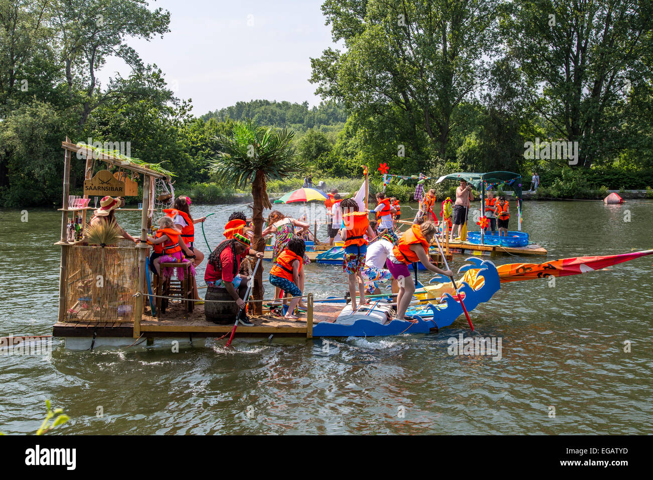 Fun boat, raft race on river Ruhr Stock Photo - Alamy