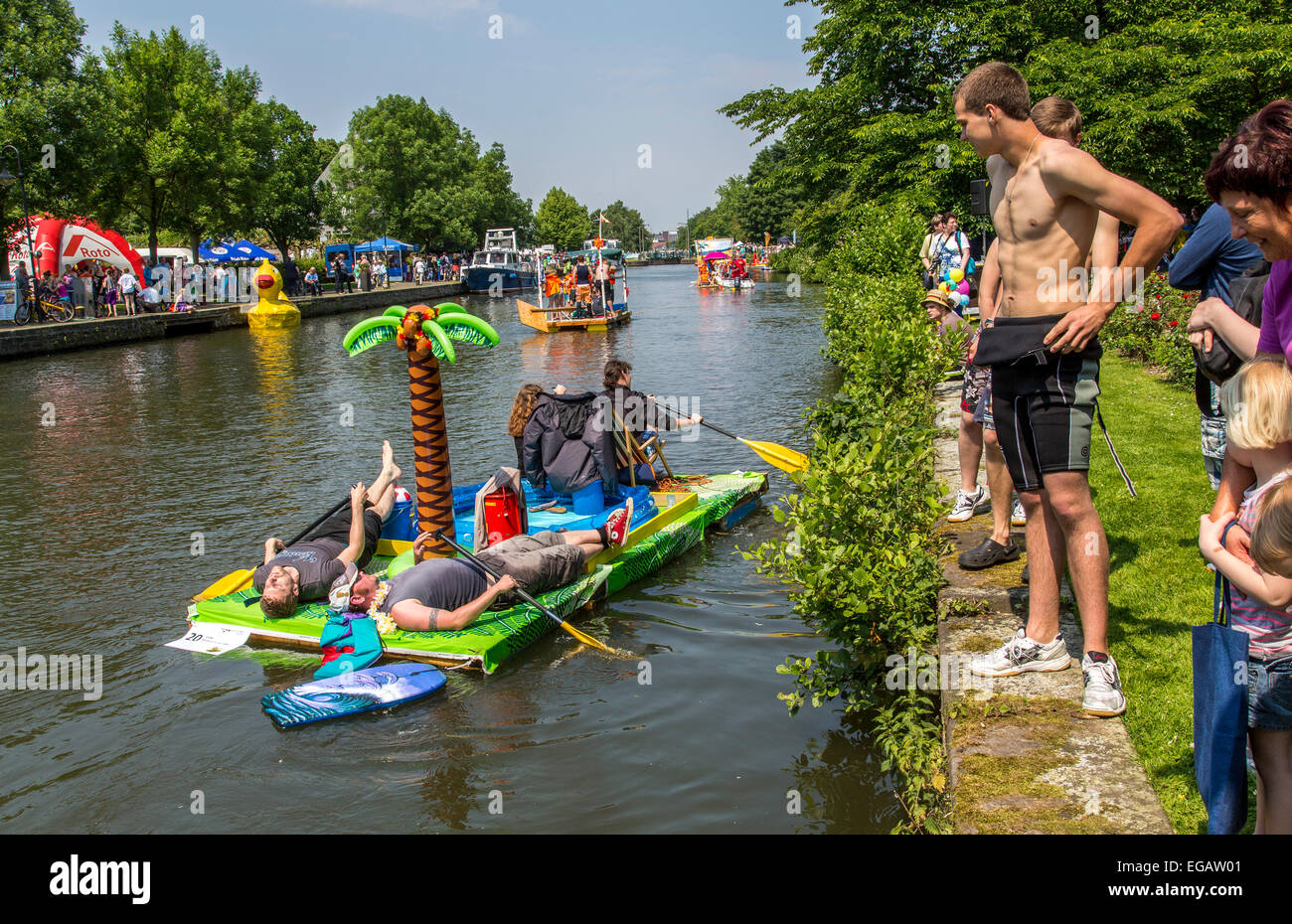 Fun boat, raft race on river Ruhr Stock Photo - Alamy