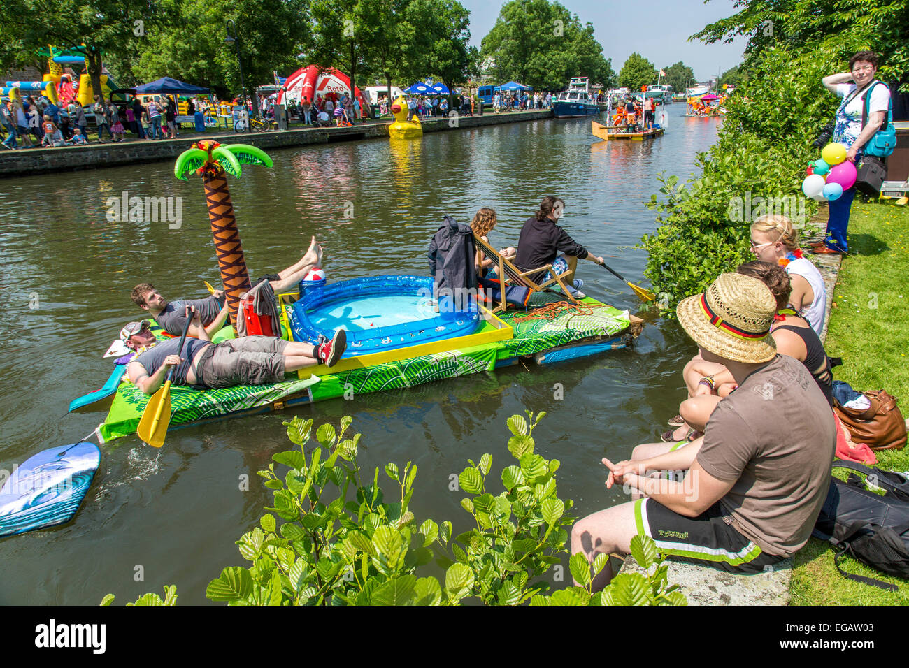 Fun boat, raft race on river Ruhr Stock Photo - Alamy