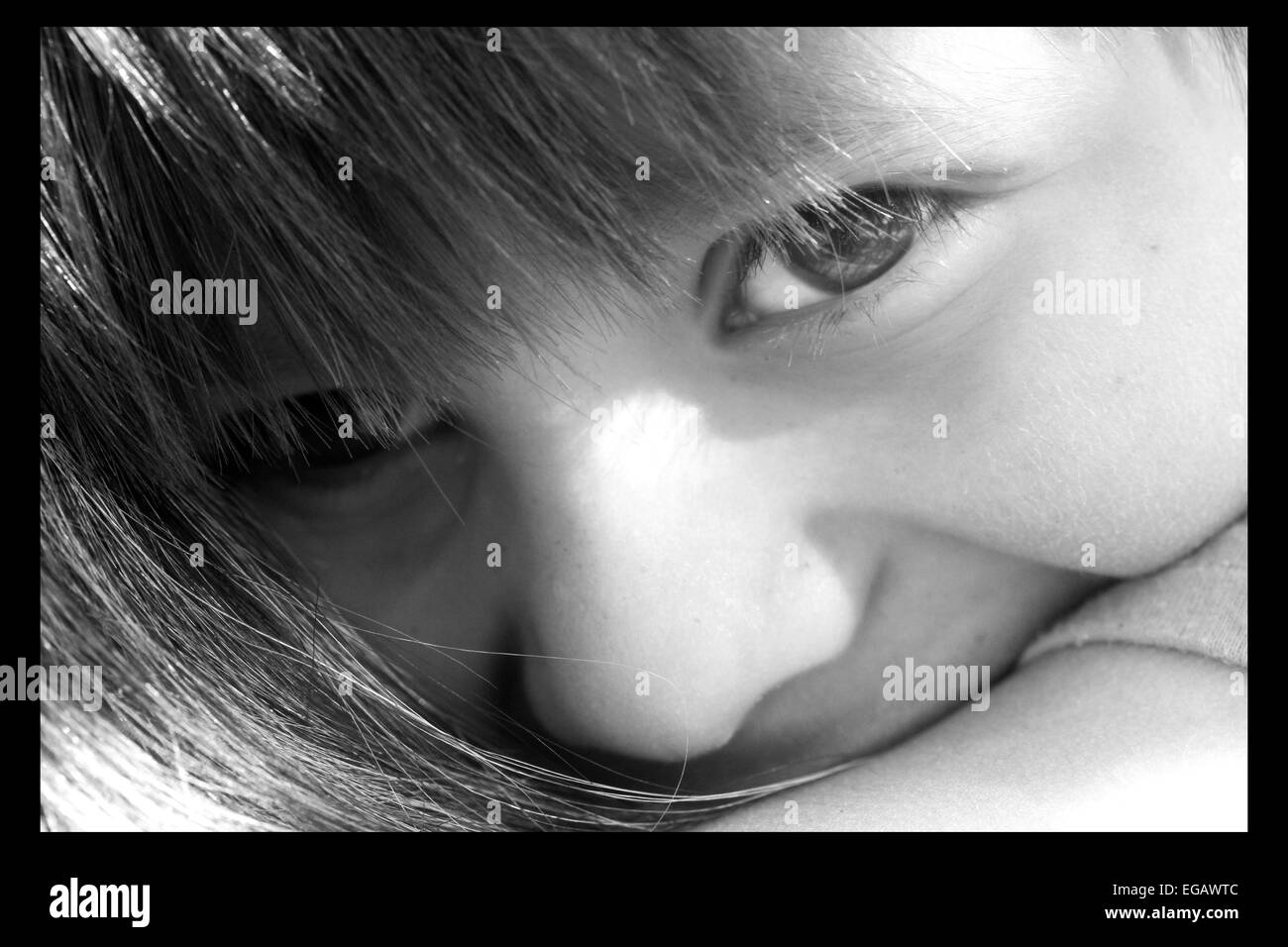 Little boy hiding Stock Photo - Alamy