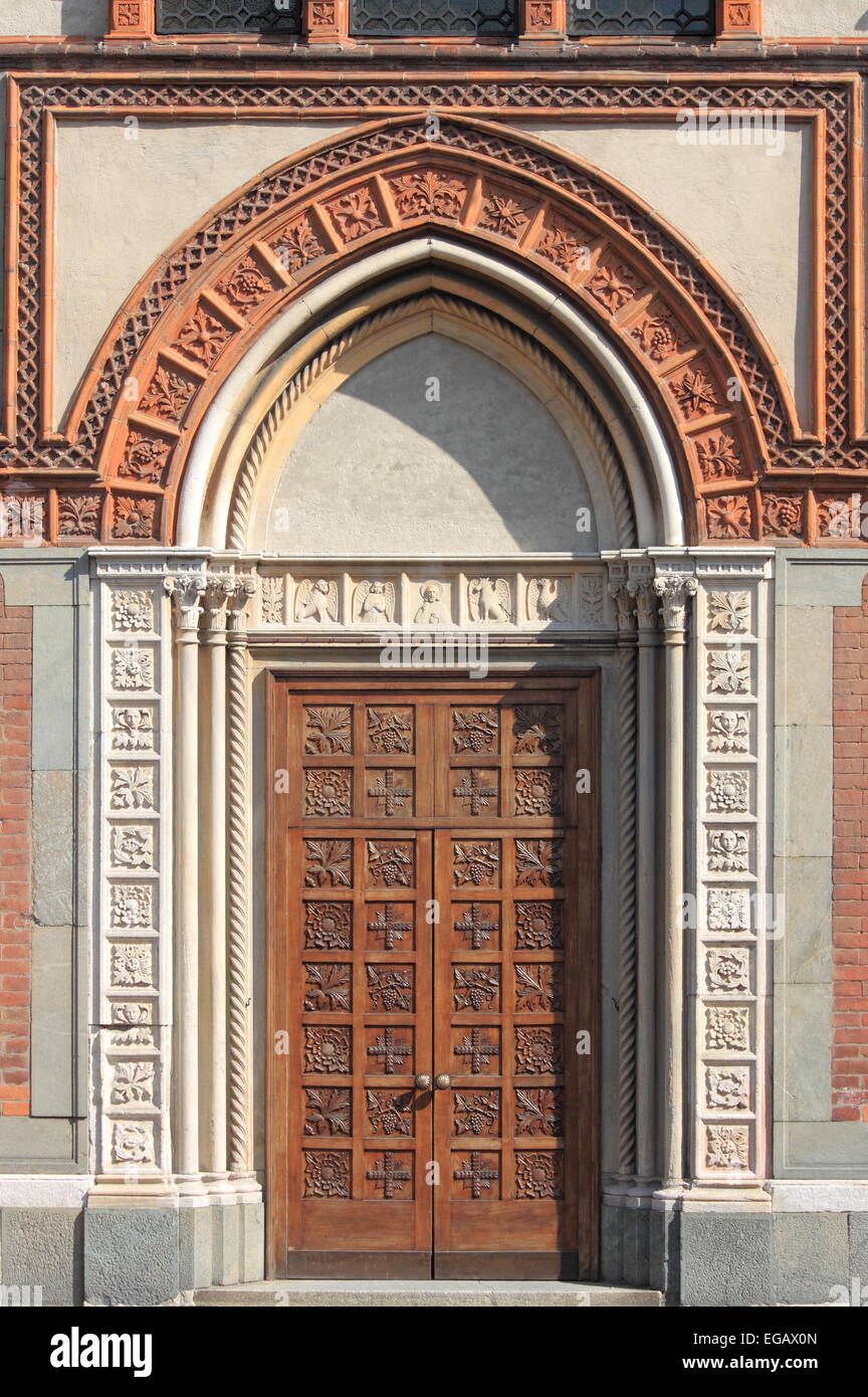 Entrance door of the romanic style church of Santa Maria in Strada ...