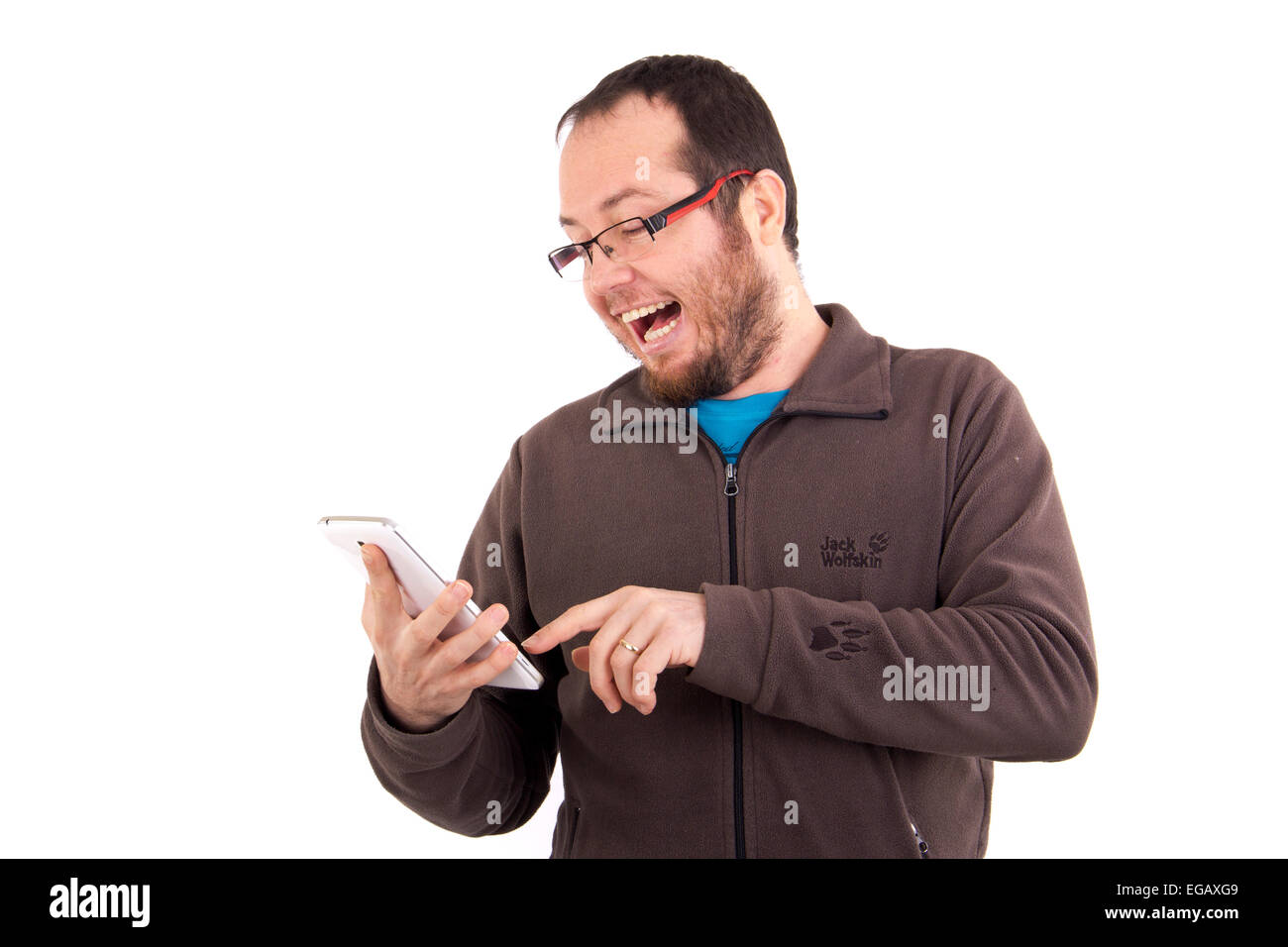 Young happy man texting message hi-res stock photography and images - Alamy