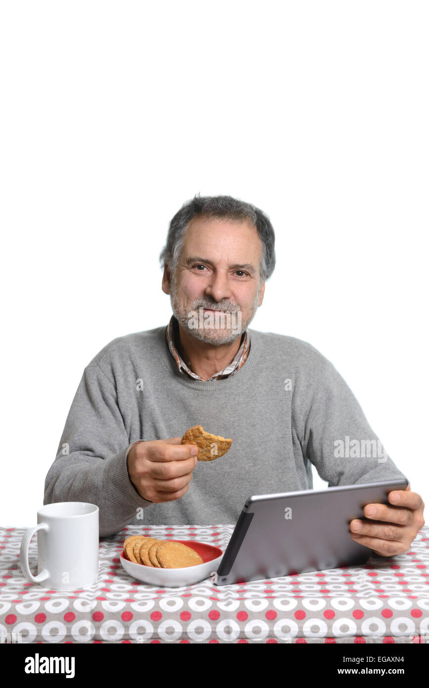 Using gadgets eating High Resolution Stock Photography and Images - Alamy