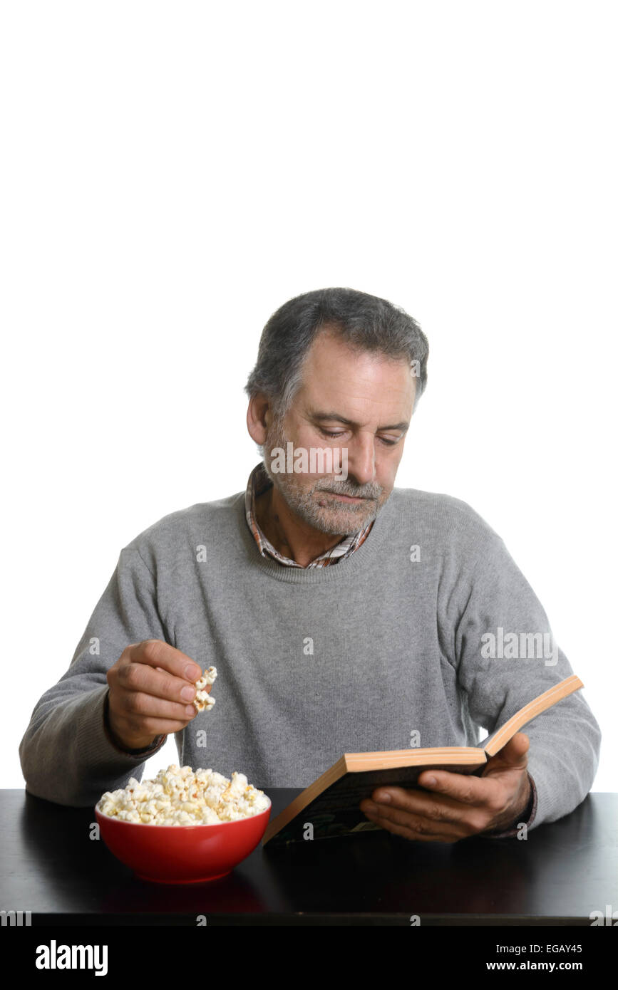 Man eating snack not woman hi-res stock photography and images - Alamy