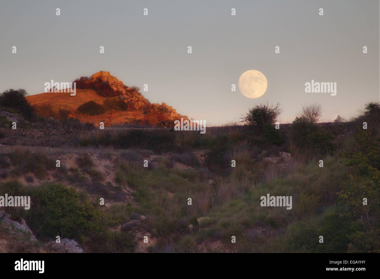 Moon sunrise in the sicilian landscape, Sicily Stock Photo - Alamy