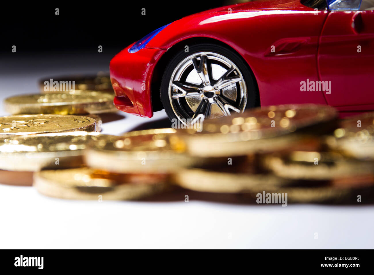 Dummy Toy Car and Gold Coin nobody Stock Photo - Alamy
