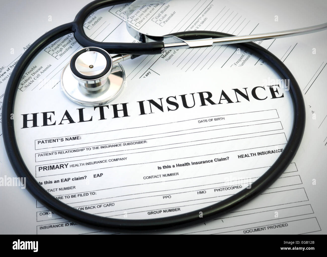Health insurance form with stethoscope concept Stock Photo - Alamy