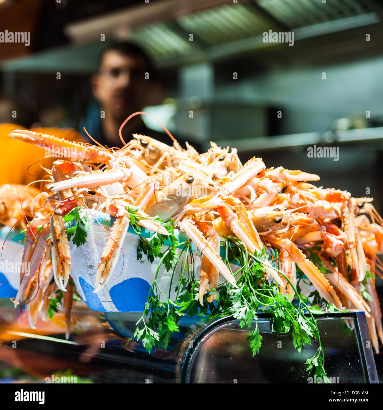 Interior of a busy fish market with detail on fresh scampi Stock Photo ...