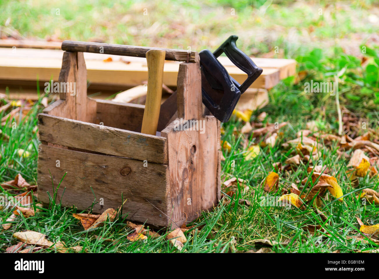 wooden box tools in the grass Stock Photo - Alamy