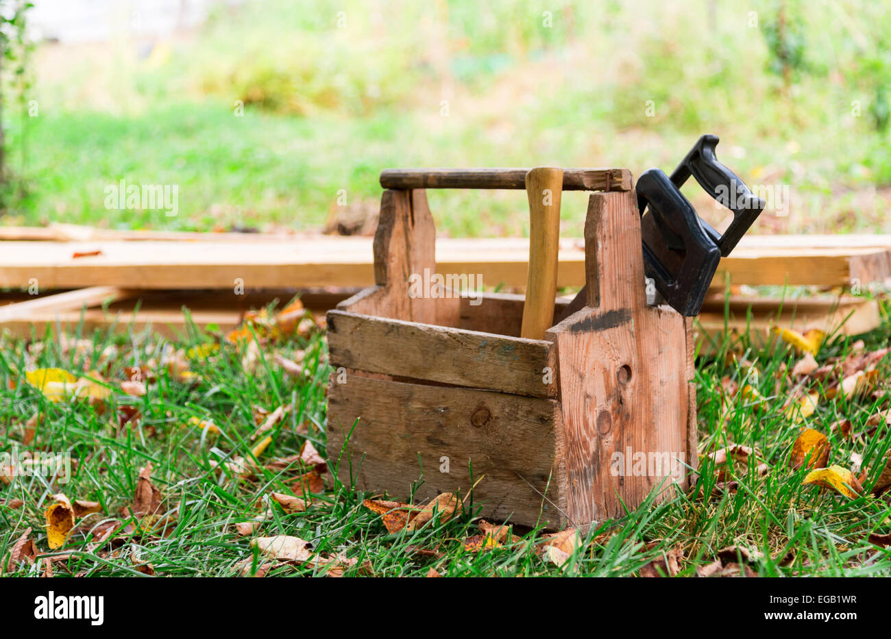 wooden box tools in the grass Stock Photo - Alamy
