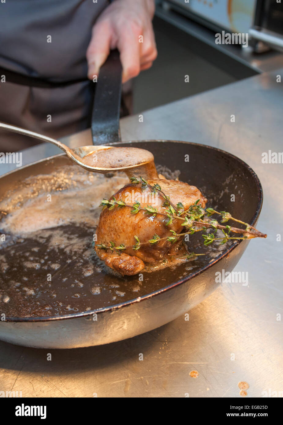 Chef preparing food in pan hi-res stock photography and images - Alamy