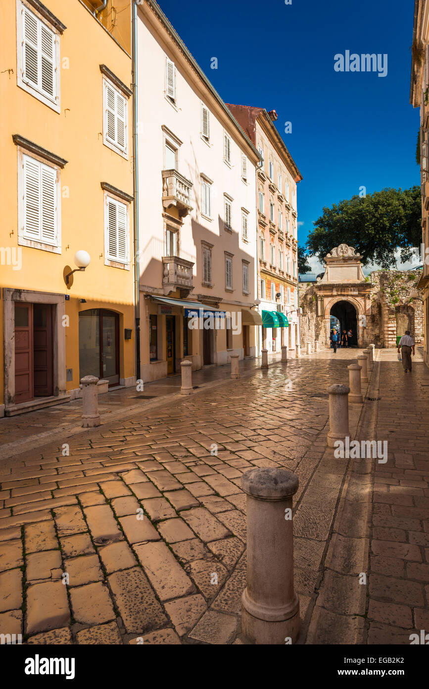 Cobblestone street and stone gate, Old Town Zadar, Dalmatian Coast ...