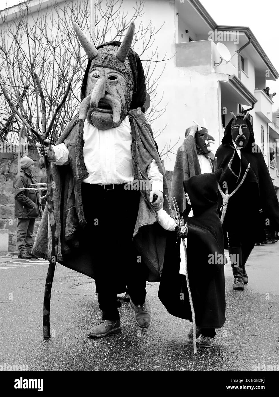 Orani, Sardinia, Italy - February 15, 2015: Parade of traditional masks ...
