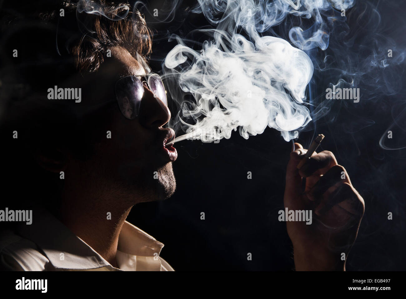 Business portraits dark background hi-res stock photography and images ...