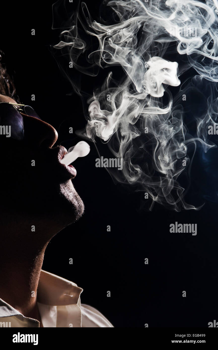 Stressed man smoke cigarette hi-res stock photography and images - Alamy